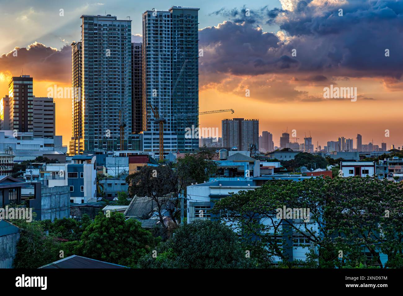 Manila landscape skyline and buildings at sunset, Philippines Stock ...