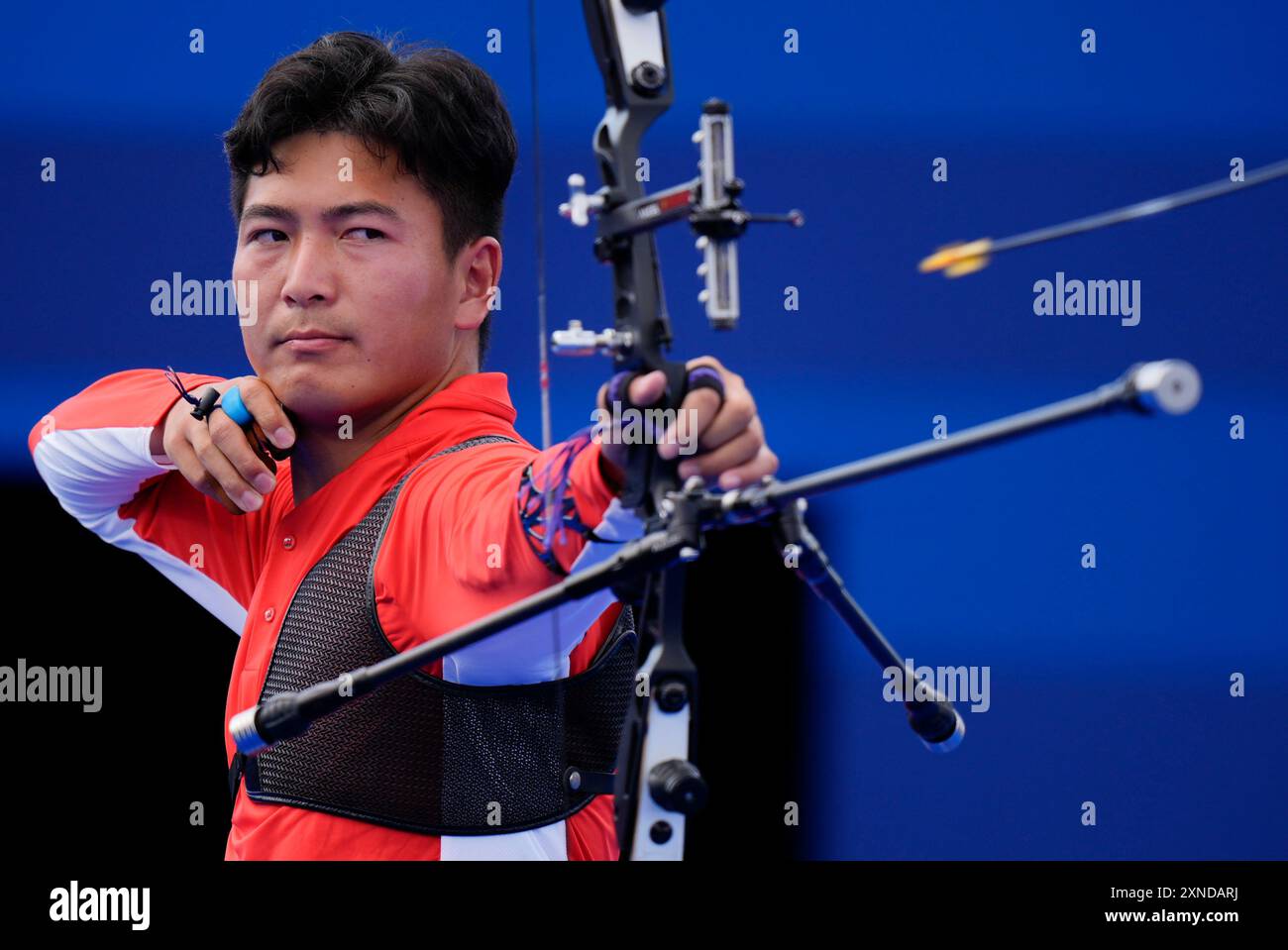 China's Yan Wang shoots during the Archery individual elimination round ...