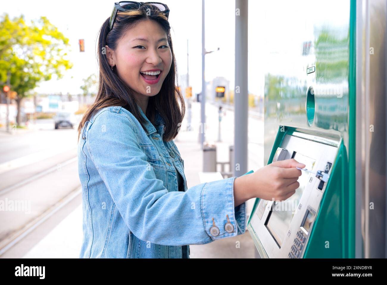 Woman train ticket smiling hi-res stock photography and images - Alamy