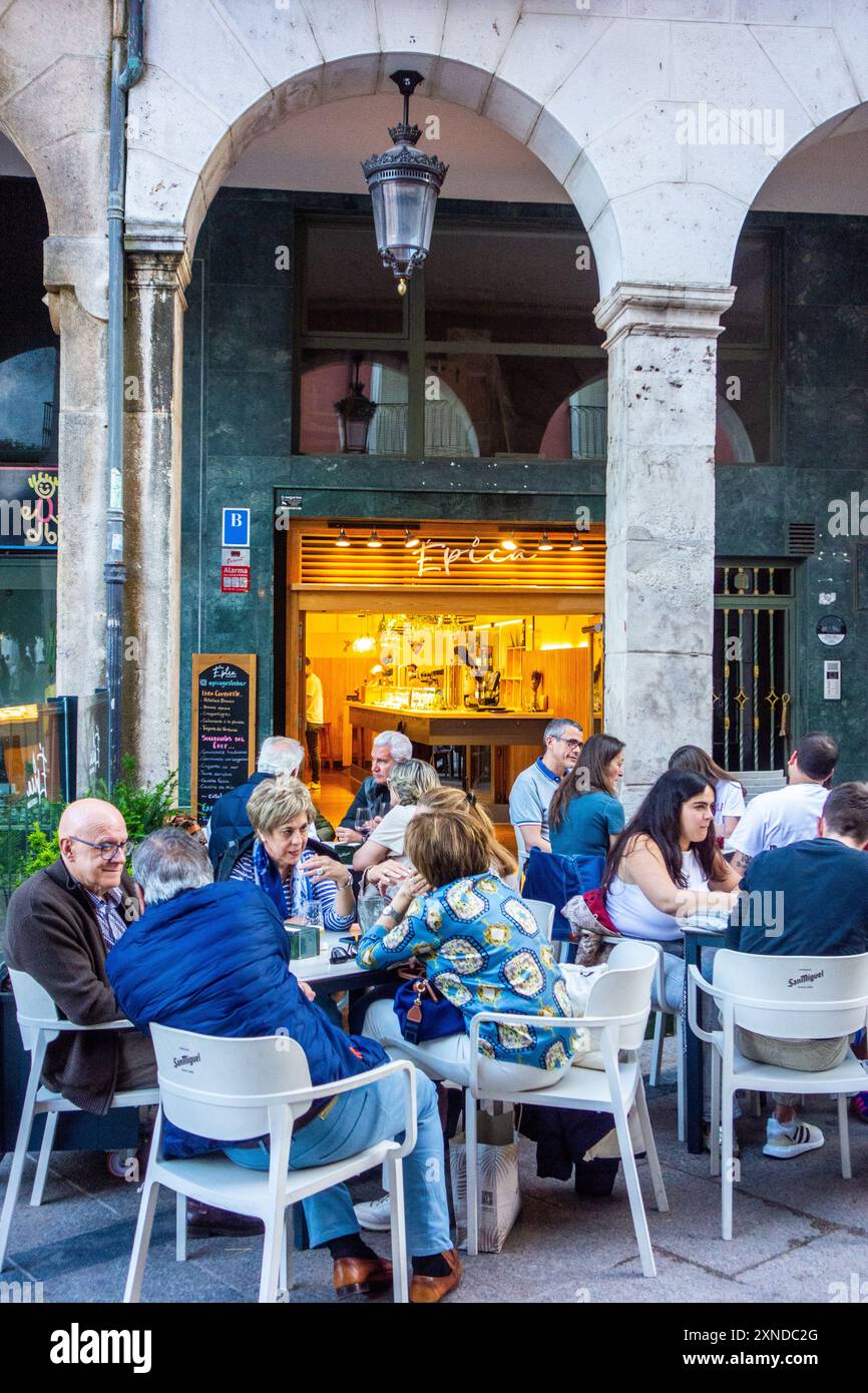 People eating and drinking at one of the many Spanish tapas bars in the ...