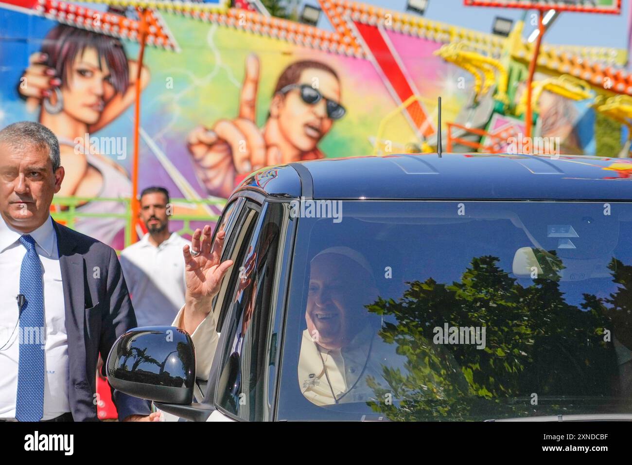 Pope Francis waves to faithful as he leaves after he met during his ...