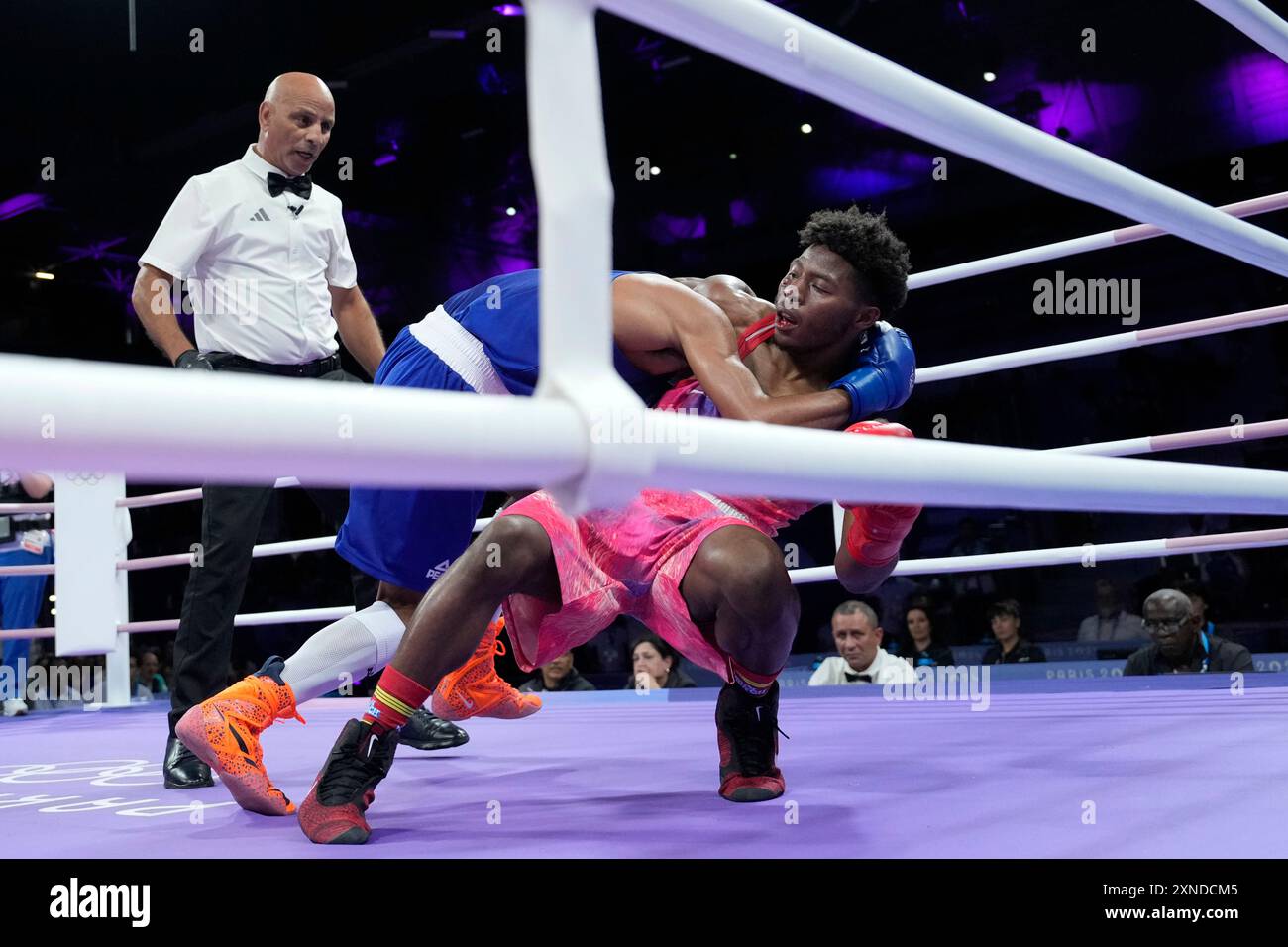 United States' Jahmal Harvey, in red and Brazil's Luiz Oliveira fall to ...