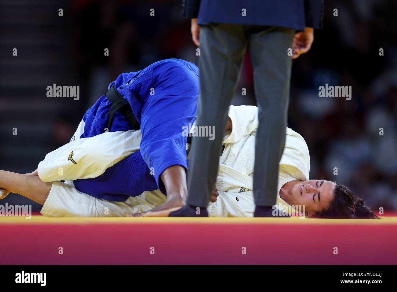Gabriella Willems (white) of Belgium and Marie-Eve Gahie (blue) of ...