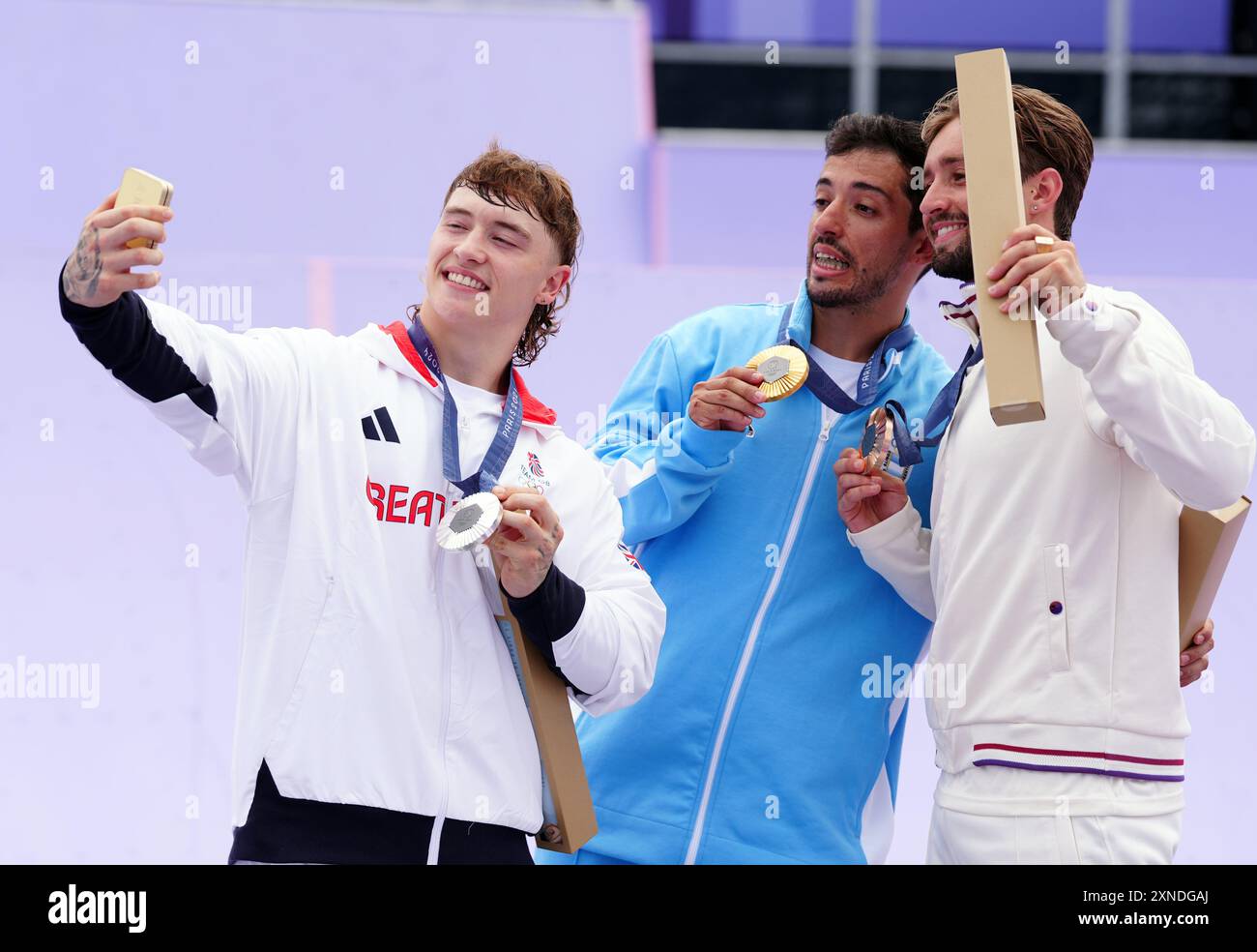 Gold medalist Jose Torres Gil of Argentina (centre), Silver medalist ...