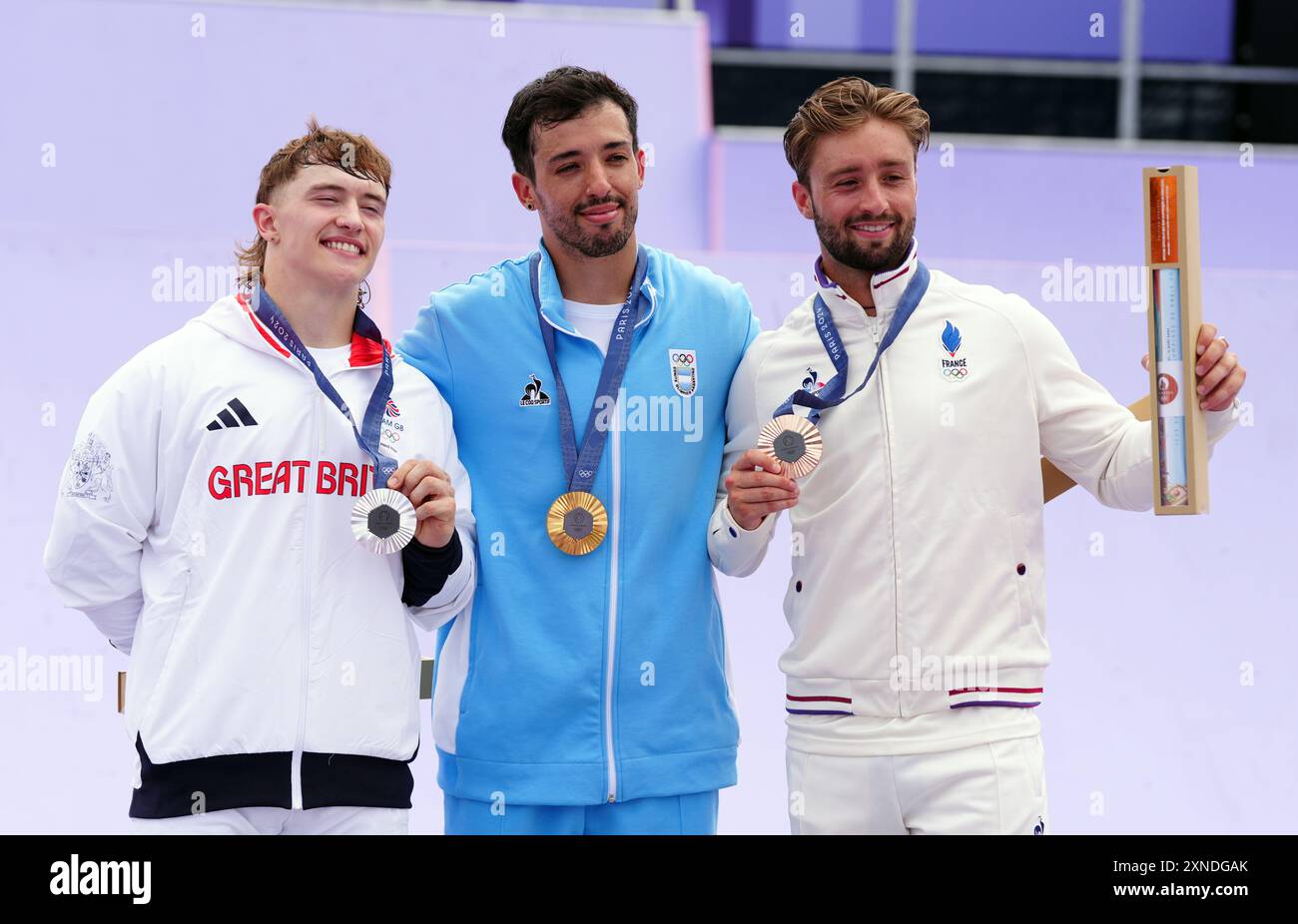 Gold medalist Jose Torres Gil of Argentina (centre), Silver medalist ...