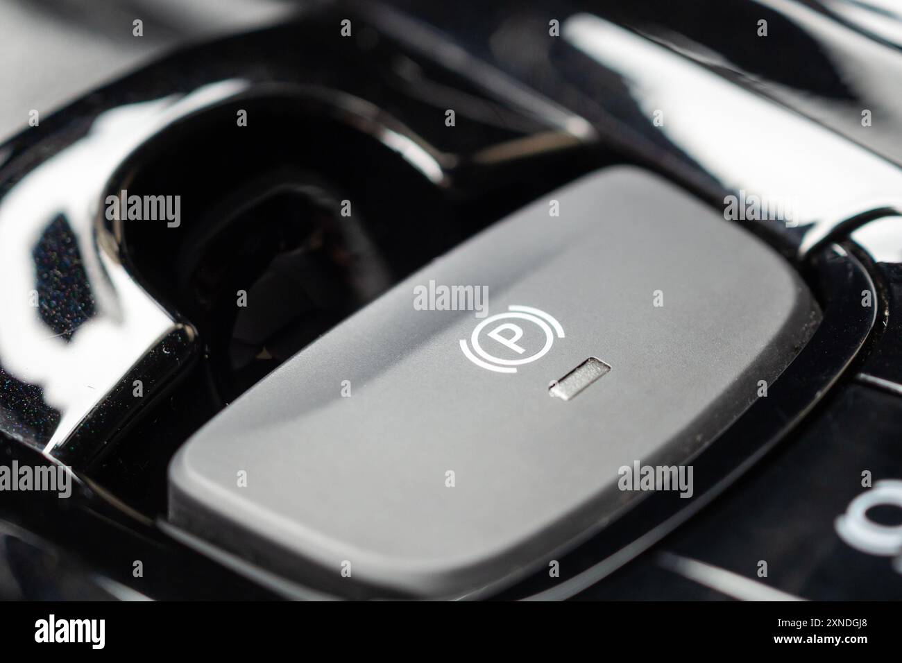 electronic handbrake button in luxury modern car Stock Photo - Alamy