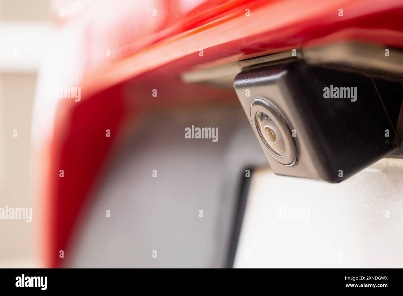 Red car rear view camera close up for parking assistance Stock Photo ...