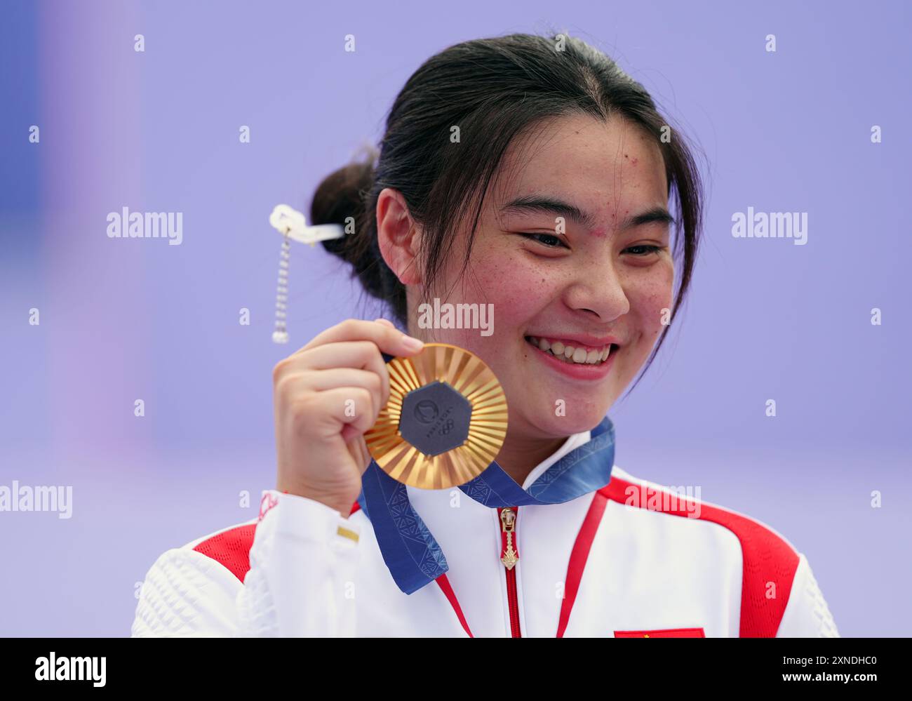 Gold medalist Yawen Deng of China poses on the podium following the ...
