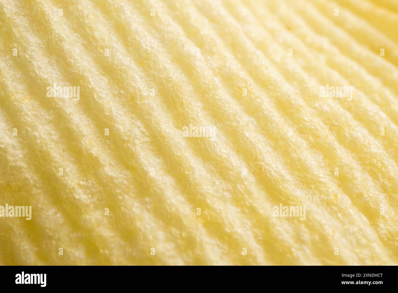 Potato chip pattern texture background closeup Stock Photo - Alamy