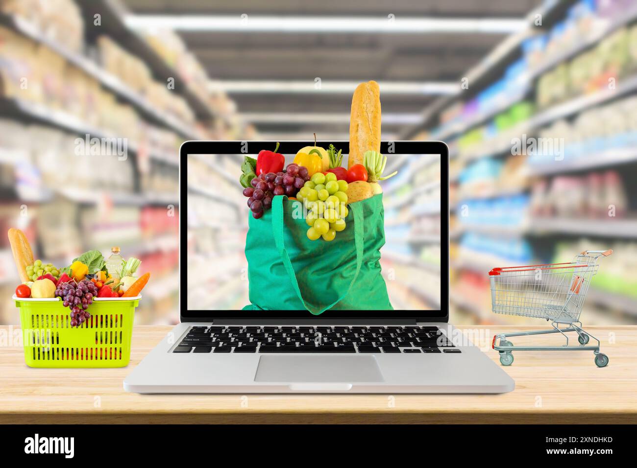 supermarket aisle blurred background with laptop computer and shopping ...