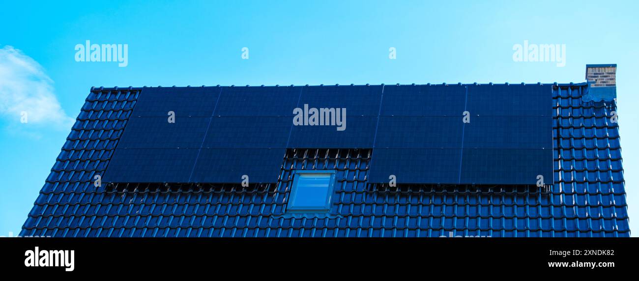 Solar panels gleam on a modern rooftop, soaking up sunlight while ...