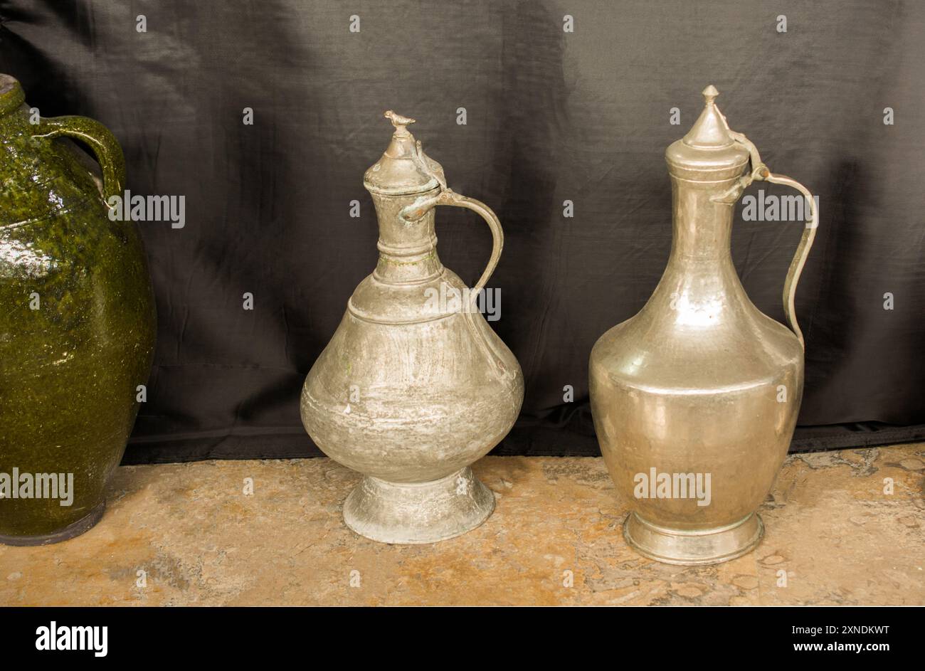 Very old style metal ewer water jar in view Stock Photo - Alamy
