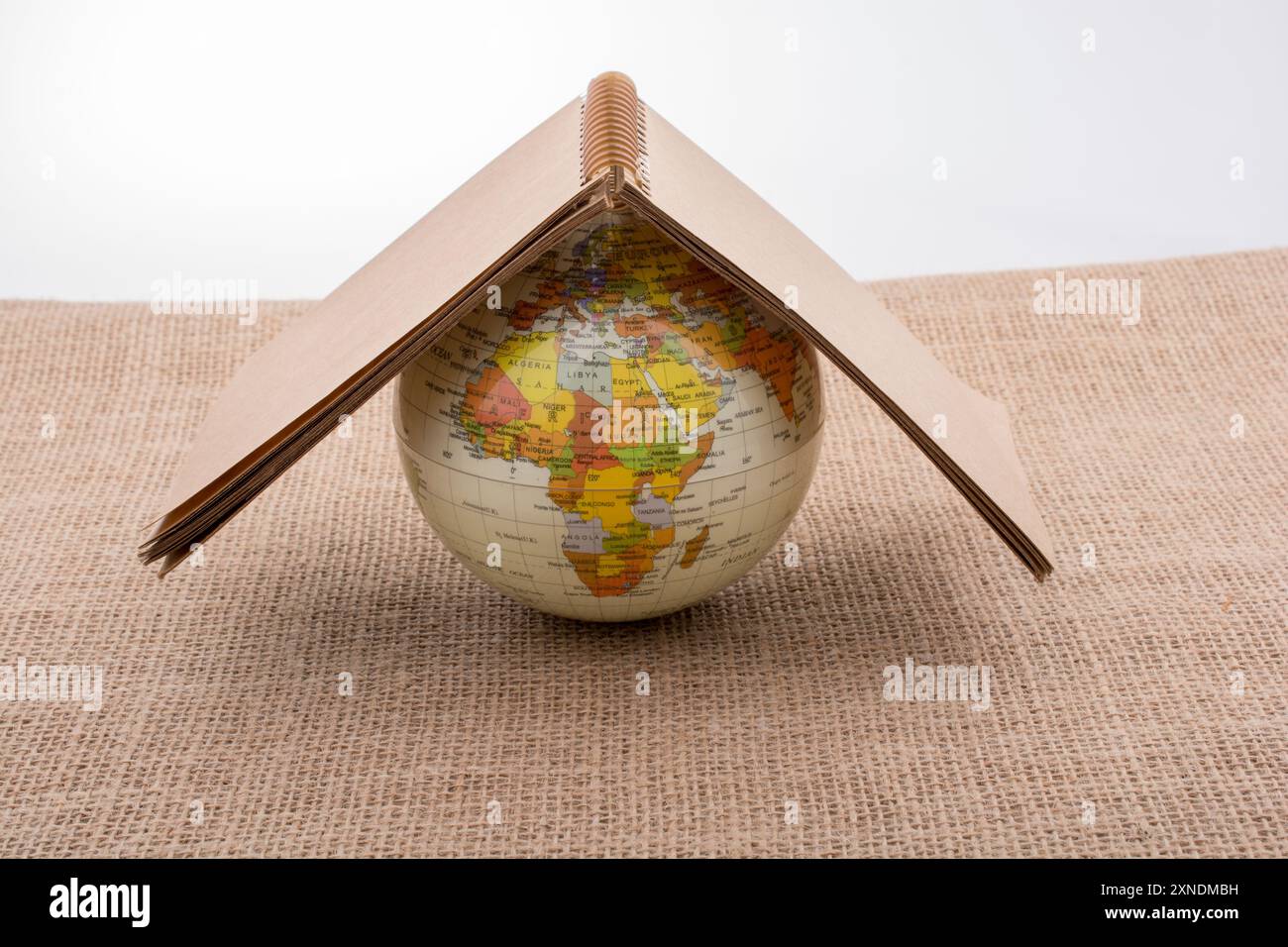 Globe is placed on canvas background Stock Photo - Alamy