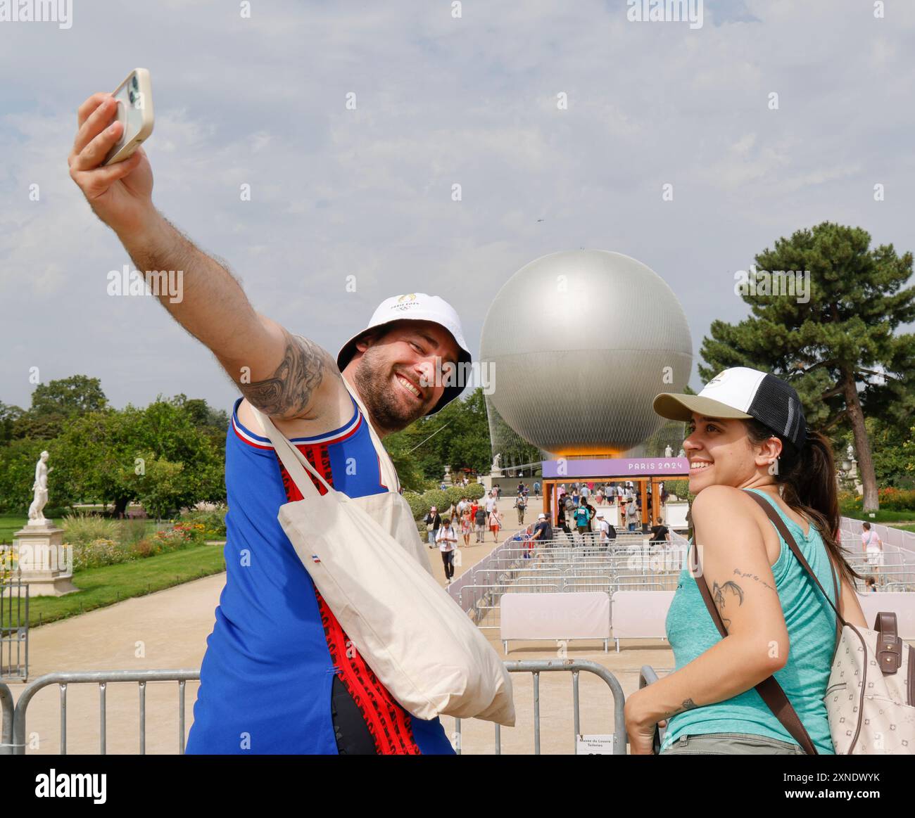 ENJOYING OLYMPIC GAMES IN PARIS Stock Photo - Alamy