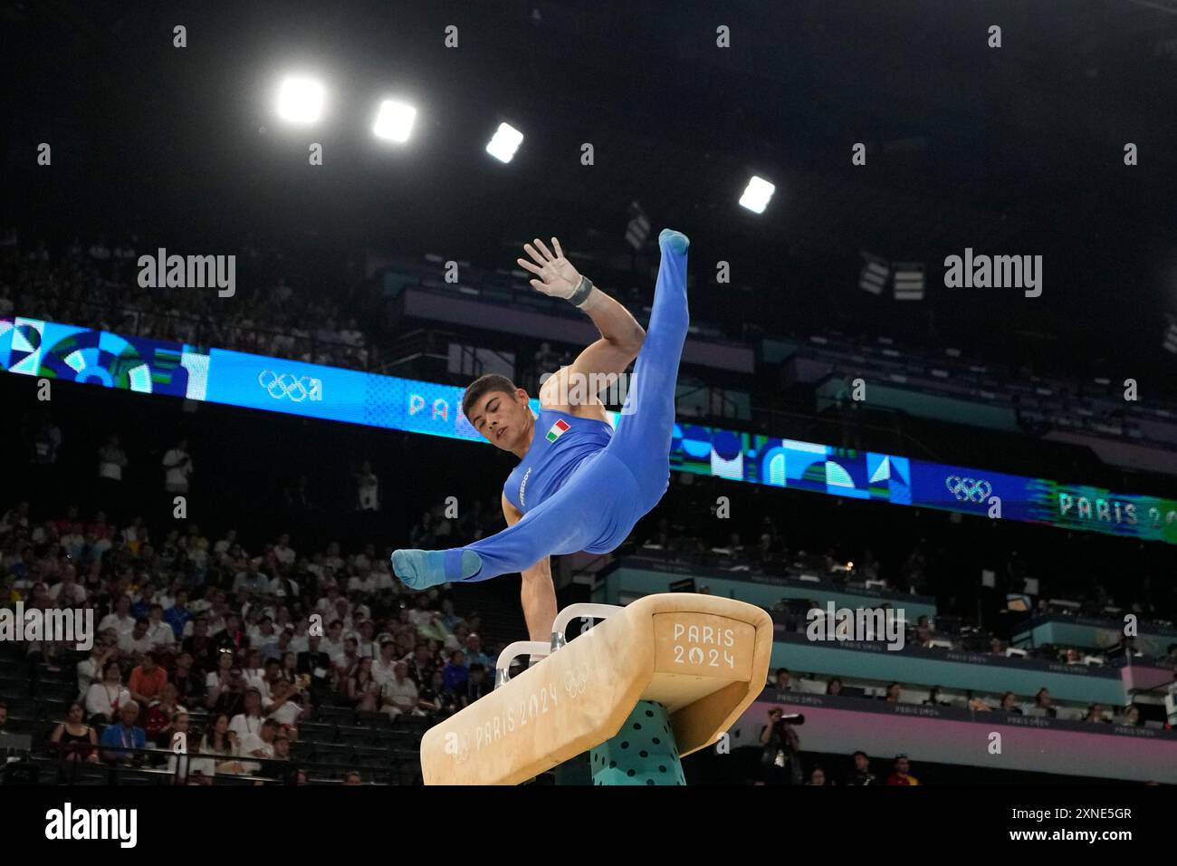 Yumin Abbadini, of Italy, performs on the pommel horse during the men's ...