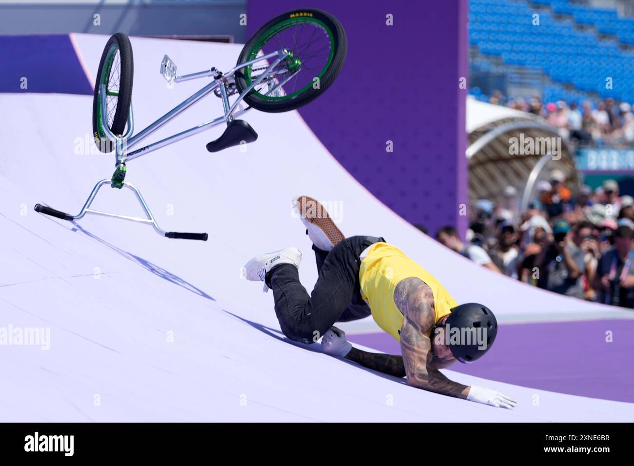 Logan Martin, of Australia, crashes on a ramp during the cycling BMX ...