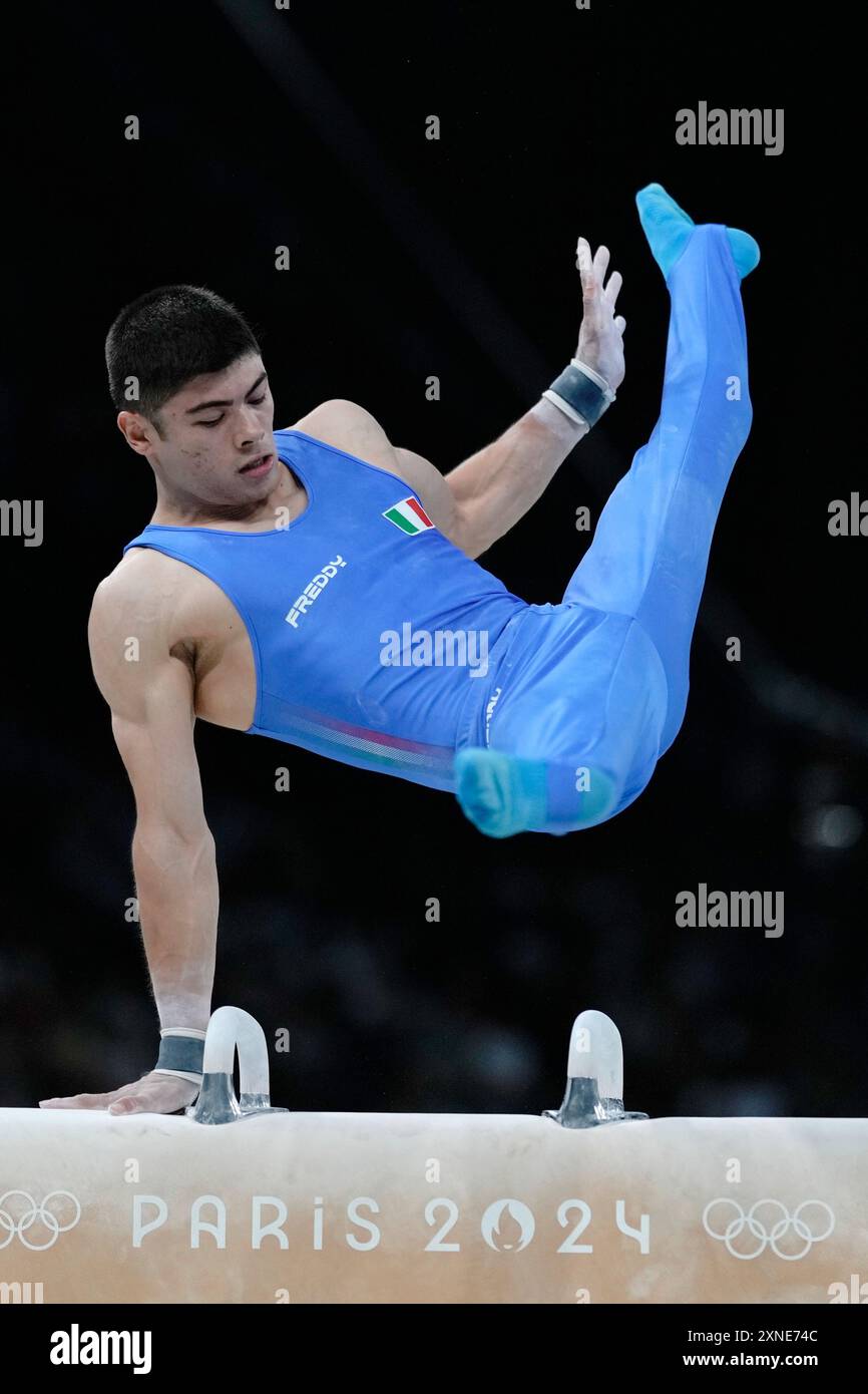Yumin Abbadini, of Italy, performs on the pommel horse during the men's ...