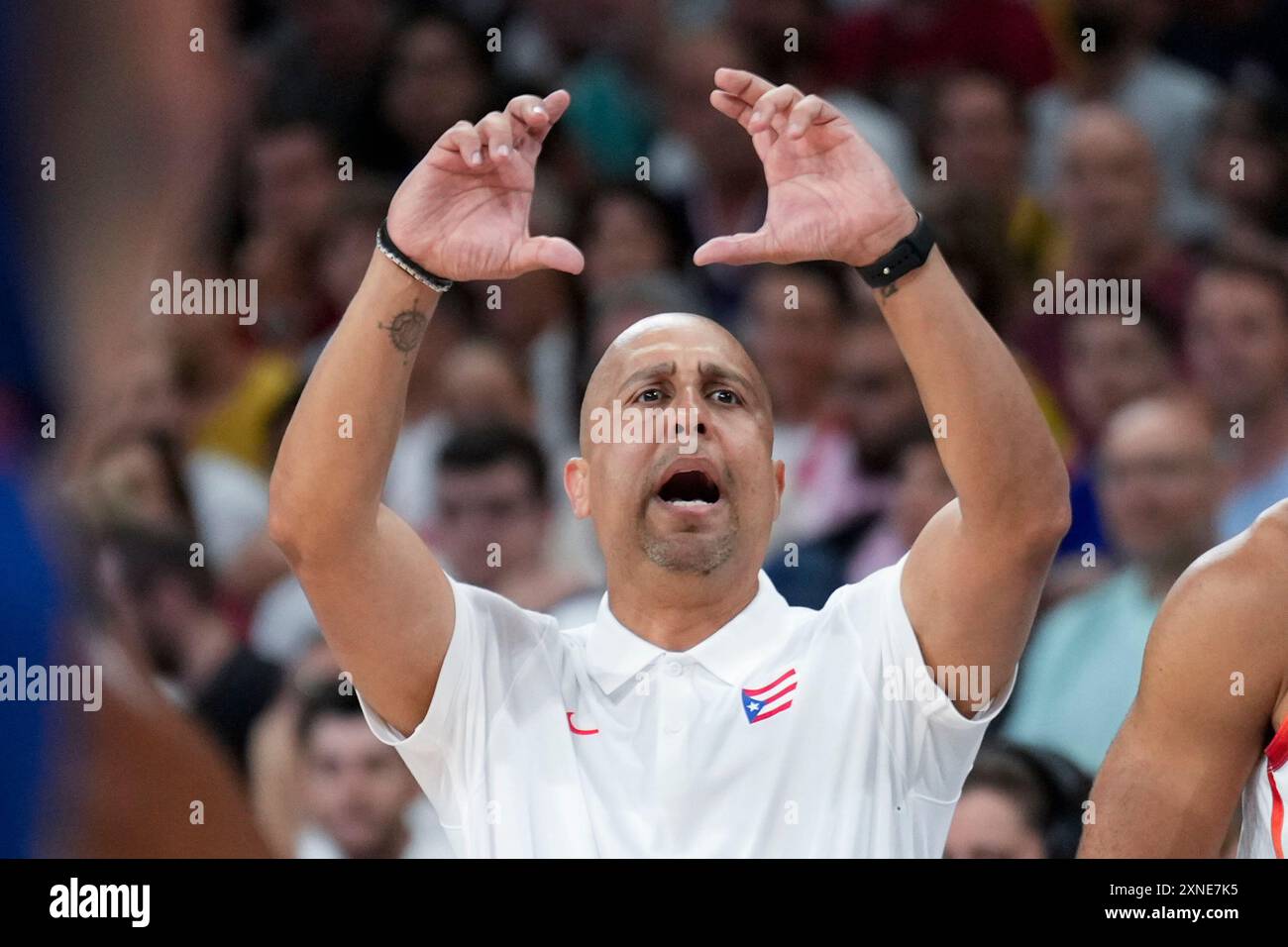Puerto Rico head coach Nelson Colon calls a play for his team as they ...