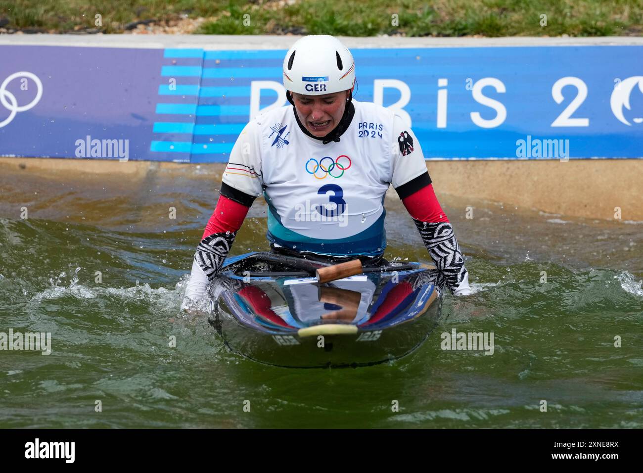 Elena Lilik of Germany reacts in the finish area of the women's canoe ...