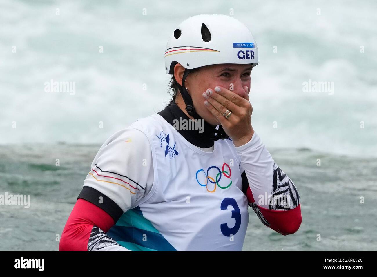 Elena Lilik of Germany reacts in the finish area of the women's canoe ...