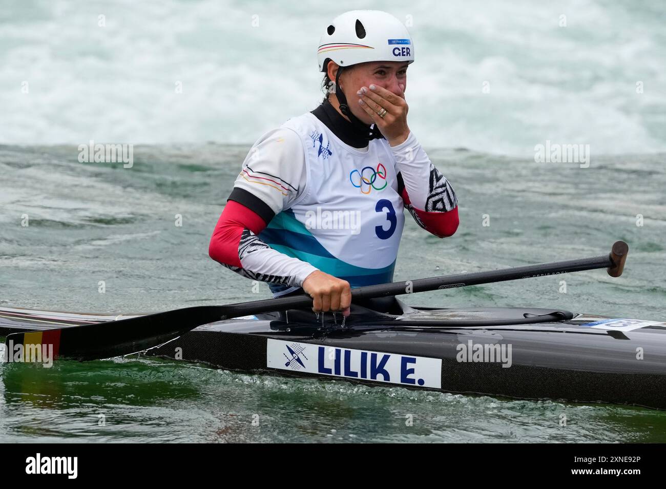 Elena Lilik of Germany reacts in the finish area of the women's canoe ...