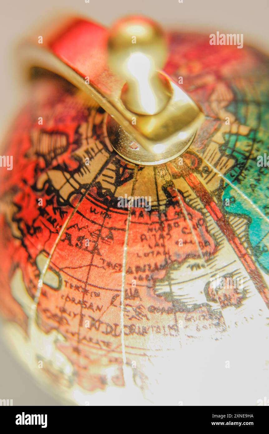 A globe with an old map in detail close-up Stock Photo - Alamy
