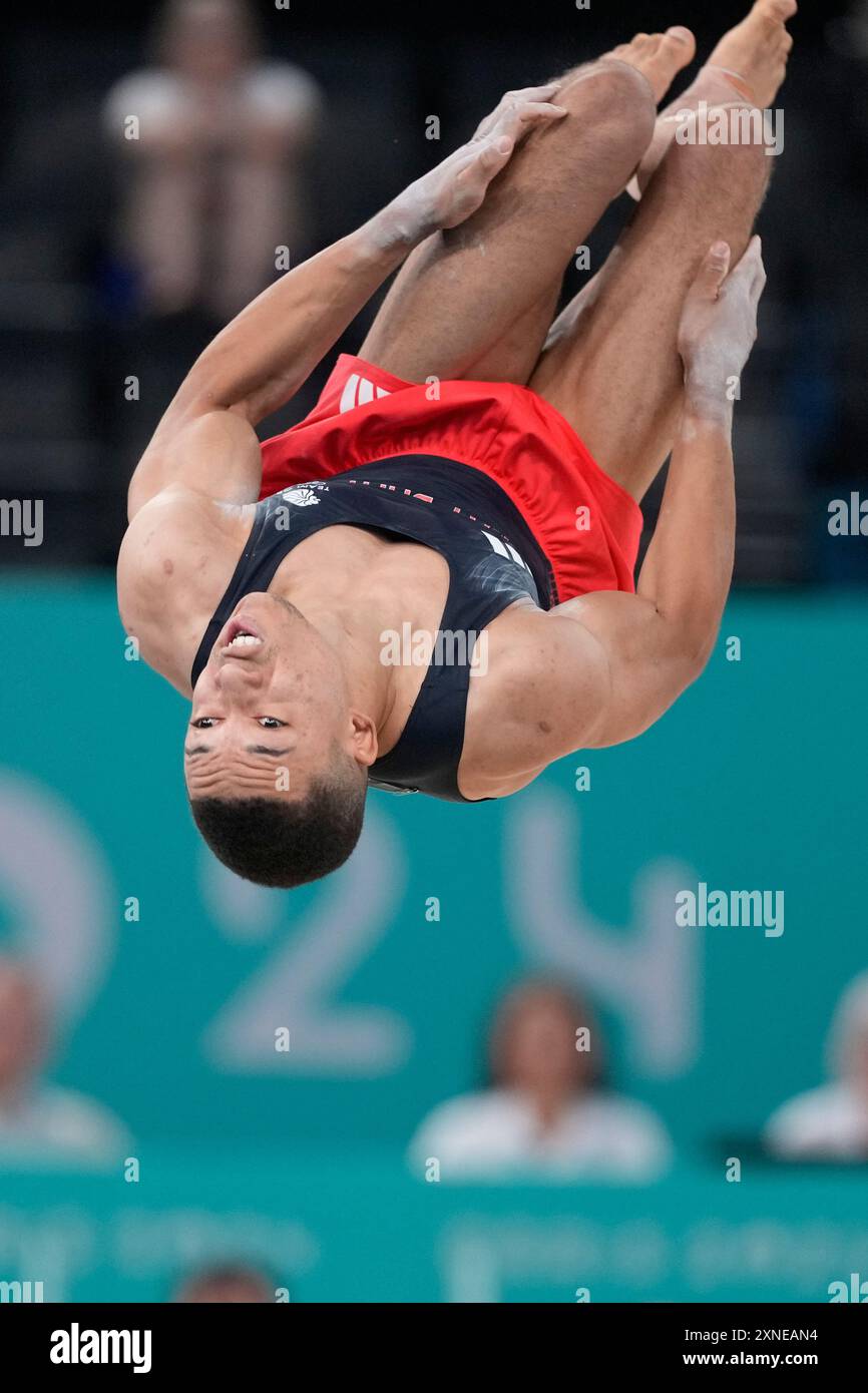 Joe Fraser, of Britain, performs on the floor during the men's artistic ...