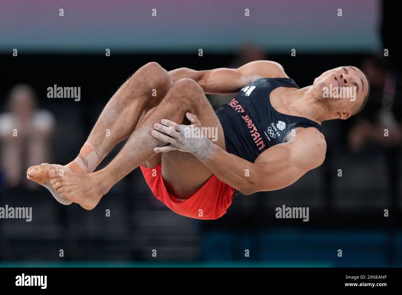 Joe Fraser, of Britain, performs on the floor during the men's artistic ...