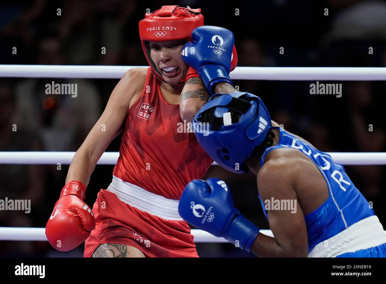 Canada's Tammara Thibeault, left, fights Refugee Olympic Team's Cindy ...