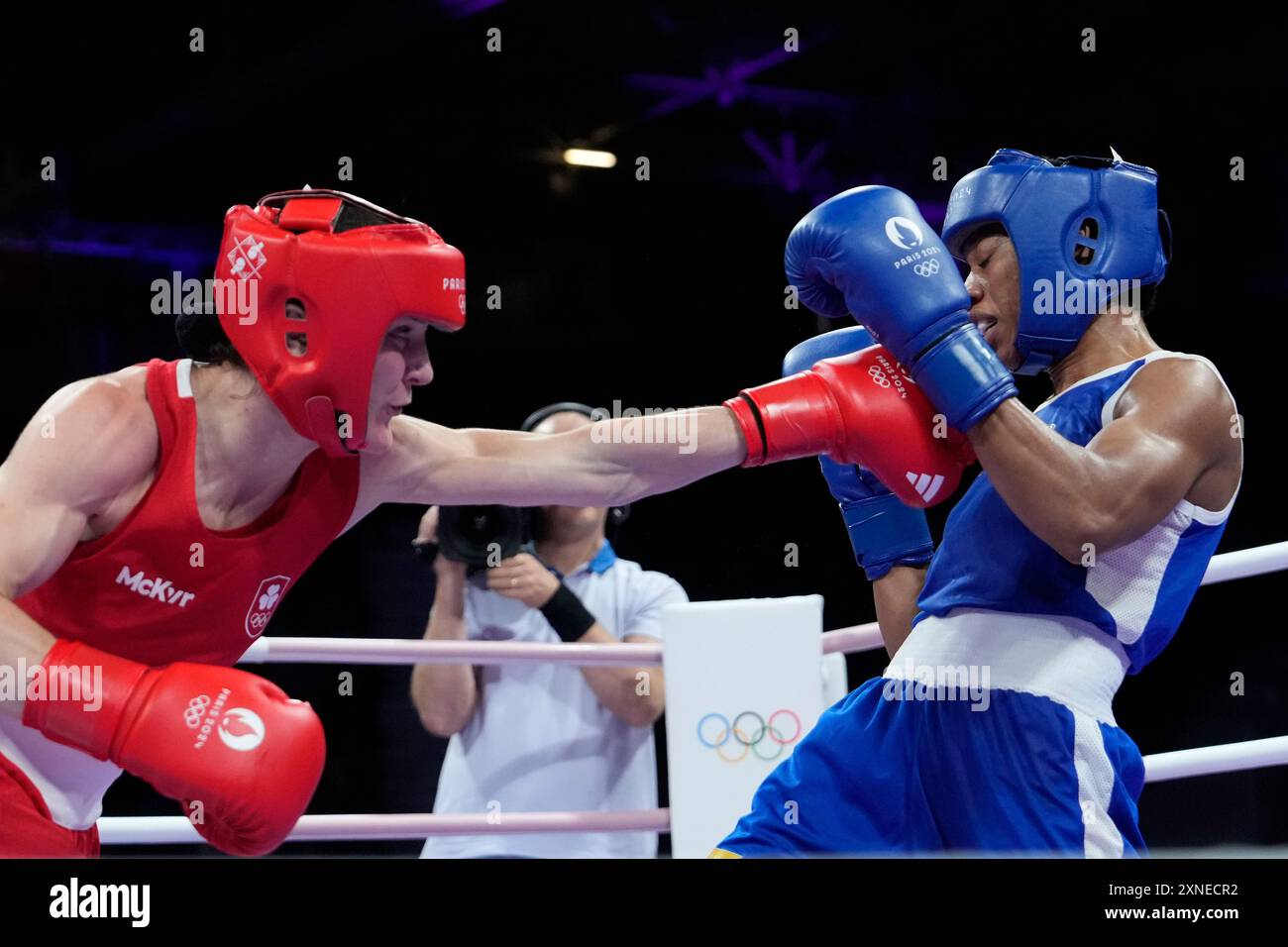 Ireland's Kellie Harrington hits Colombia's Angie Valdes in their women ...