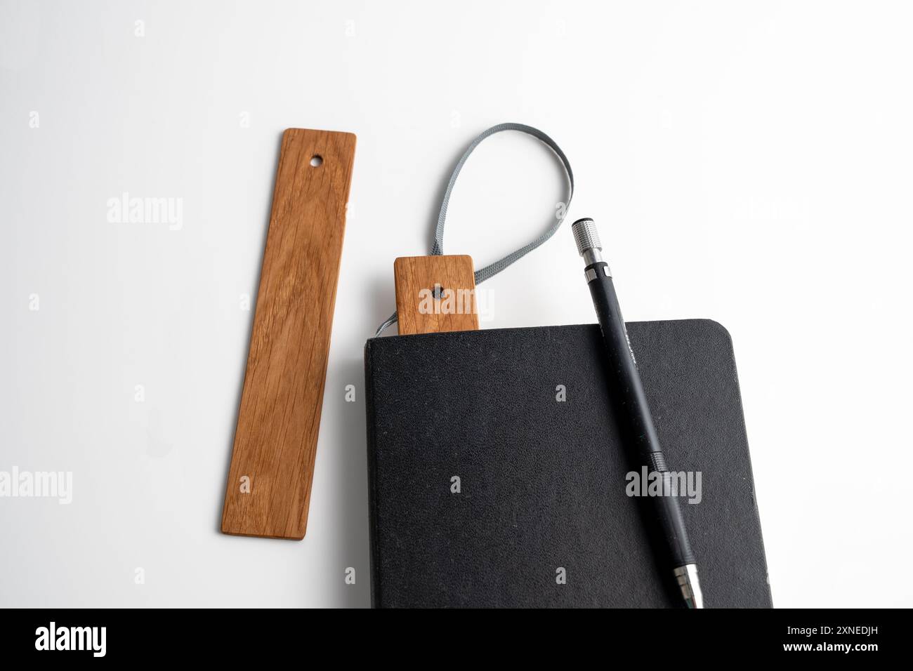hand made hardwood book marks page holders with black note book and ...