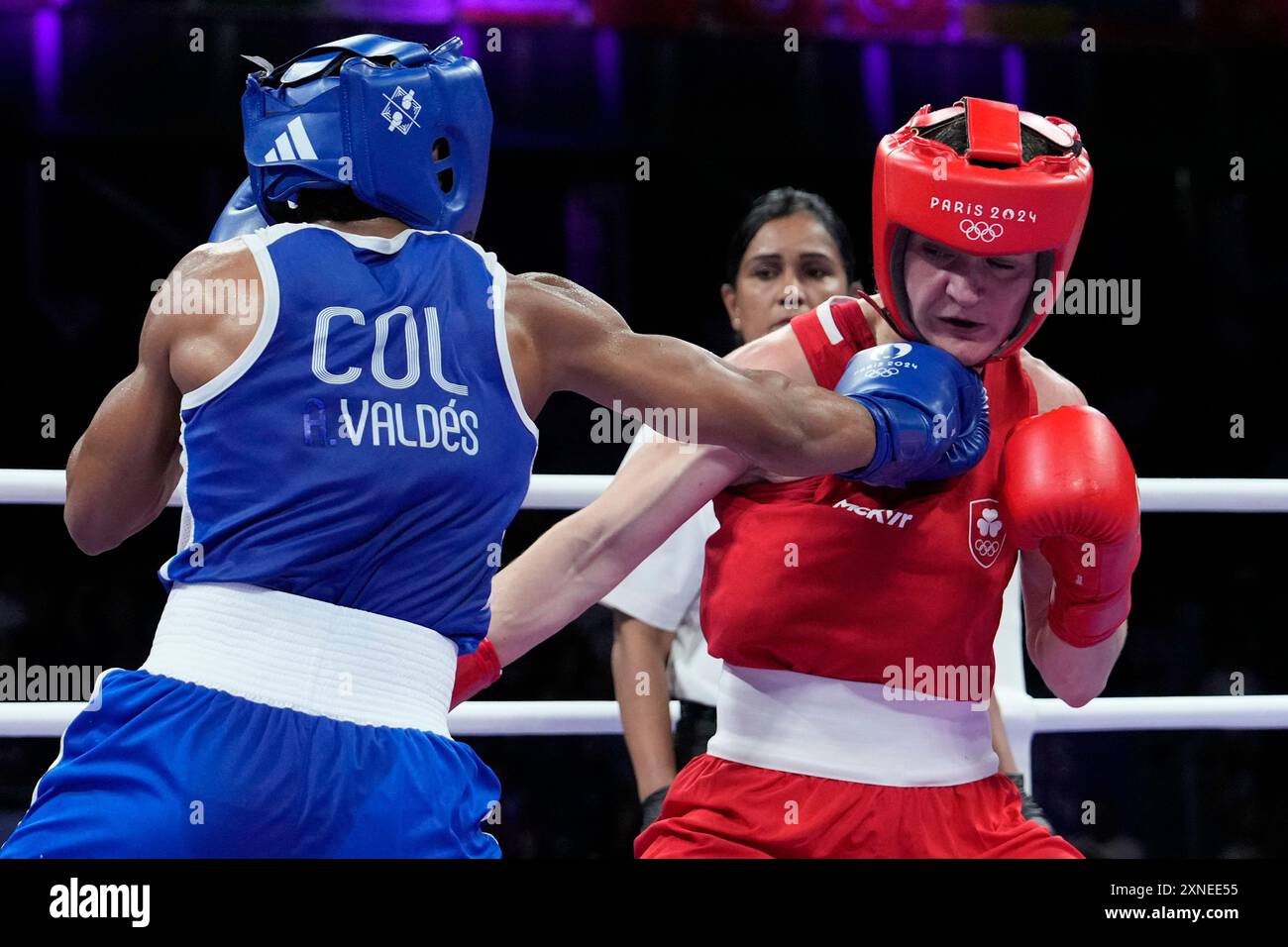 Colombia's Angie Valdes hits Ireland's Kellie Harrington in their women ...