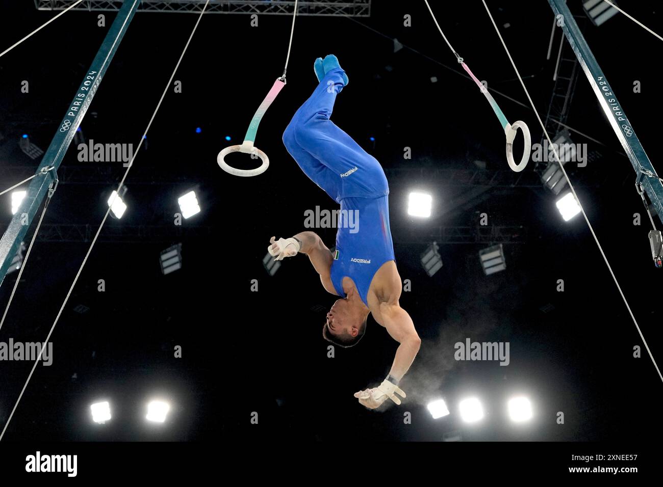 Yumin Abbadini, of Italy, performs on the rings during the men's ...