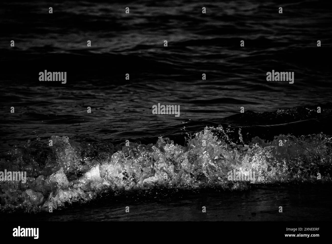 Black and white image of dramatic sea waves crashing along the Black Sea coast in Romania Stock ...