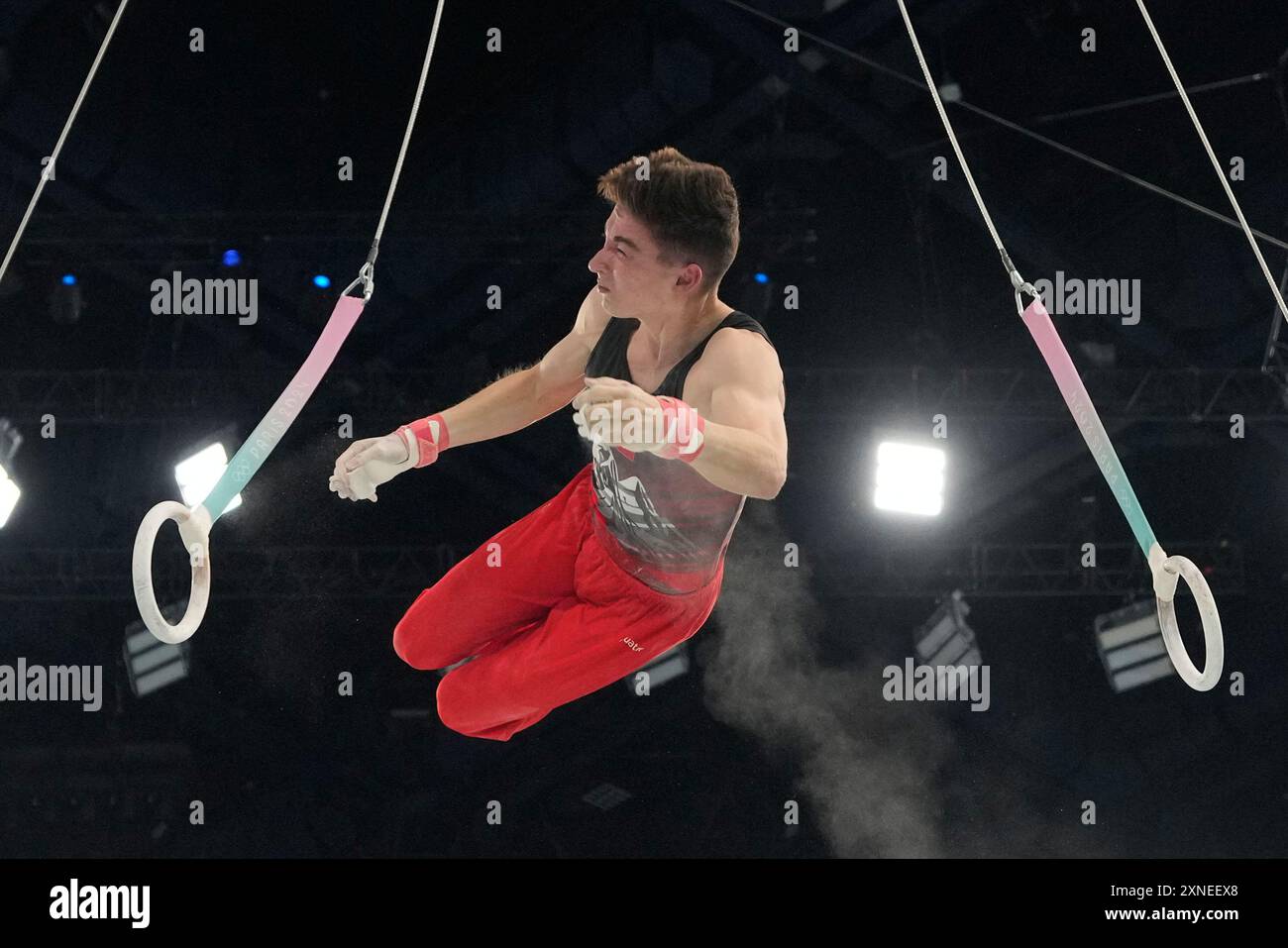 Matteo Giubellini, of Switzerland, performs on the rings during the men ...