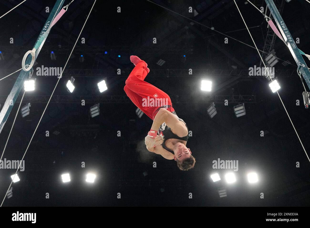 Matteo Giubellini, of Switzerland, performs on the rings during the men ...