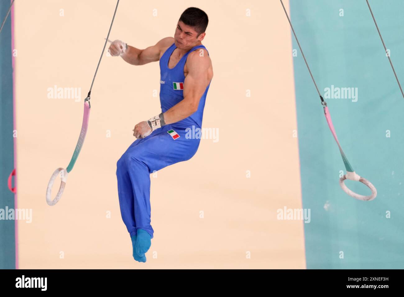 Yumin Abbadini, of Italy, performs on the rings during the men's ...