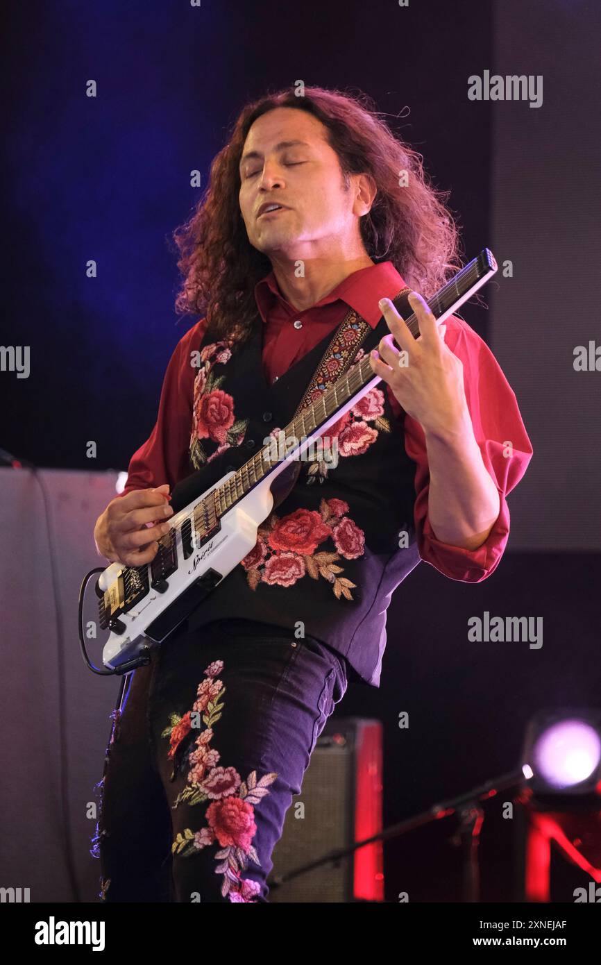 Ed Rodriguez of Deerhoof performing at the Womad festival, Charlton ...