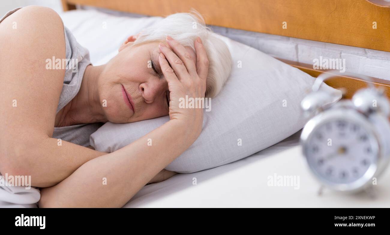 Restless woman suffering from sleep hi-res stock photography and images ...