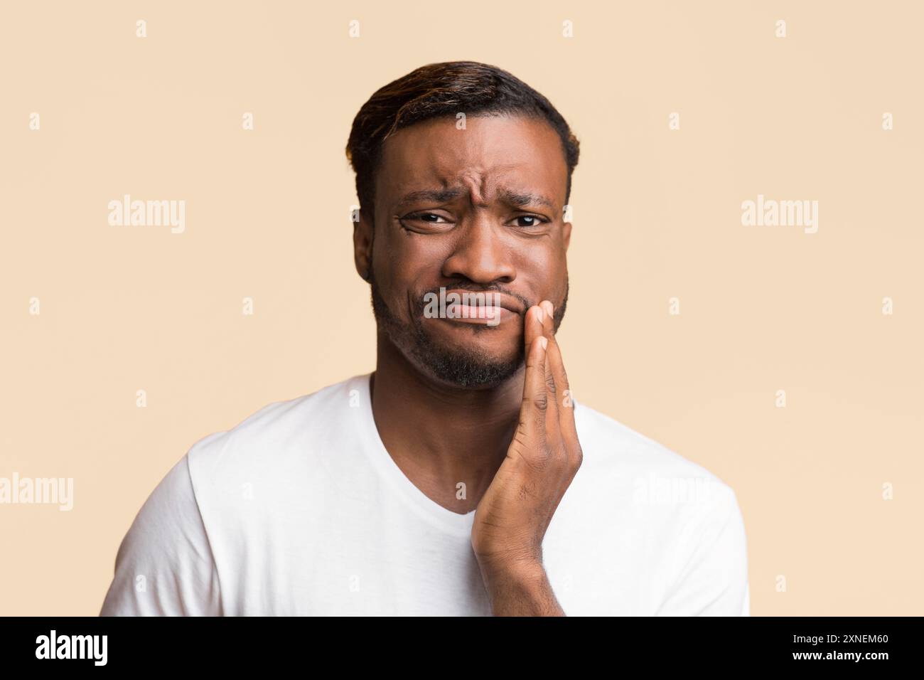 Portrait african man having toothache hi-res stock photography and ...