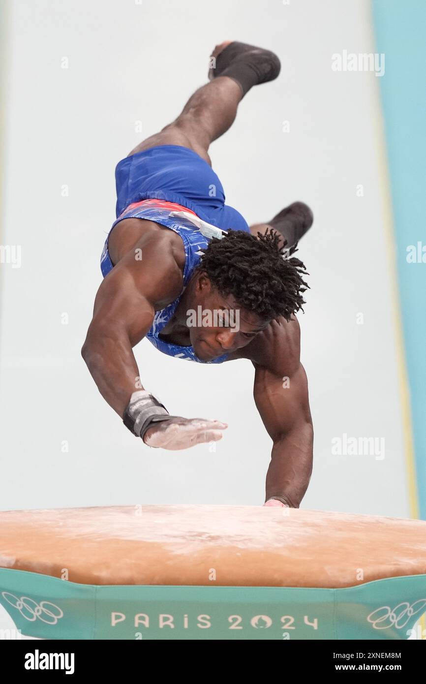 Frederick Richard, of the United States, performs on the vault during ...