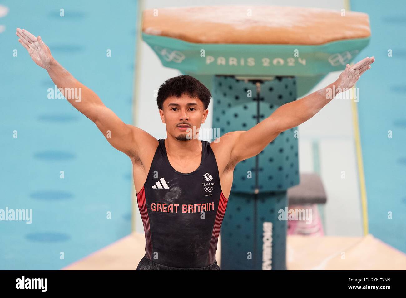 Jake Jarman, of Britain, performs on the vault during the men's ...