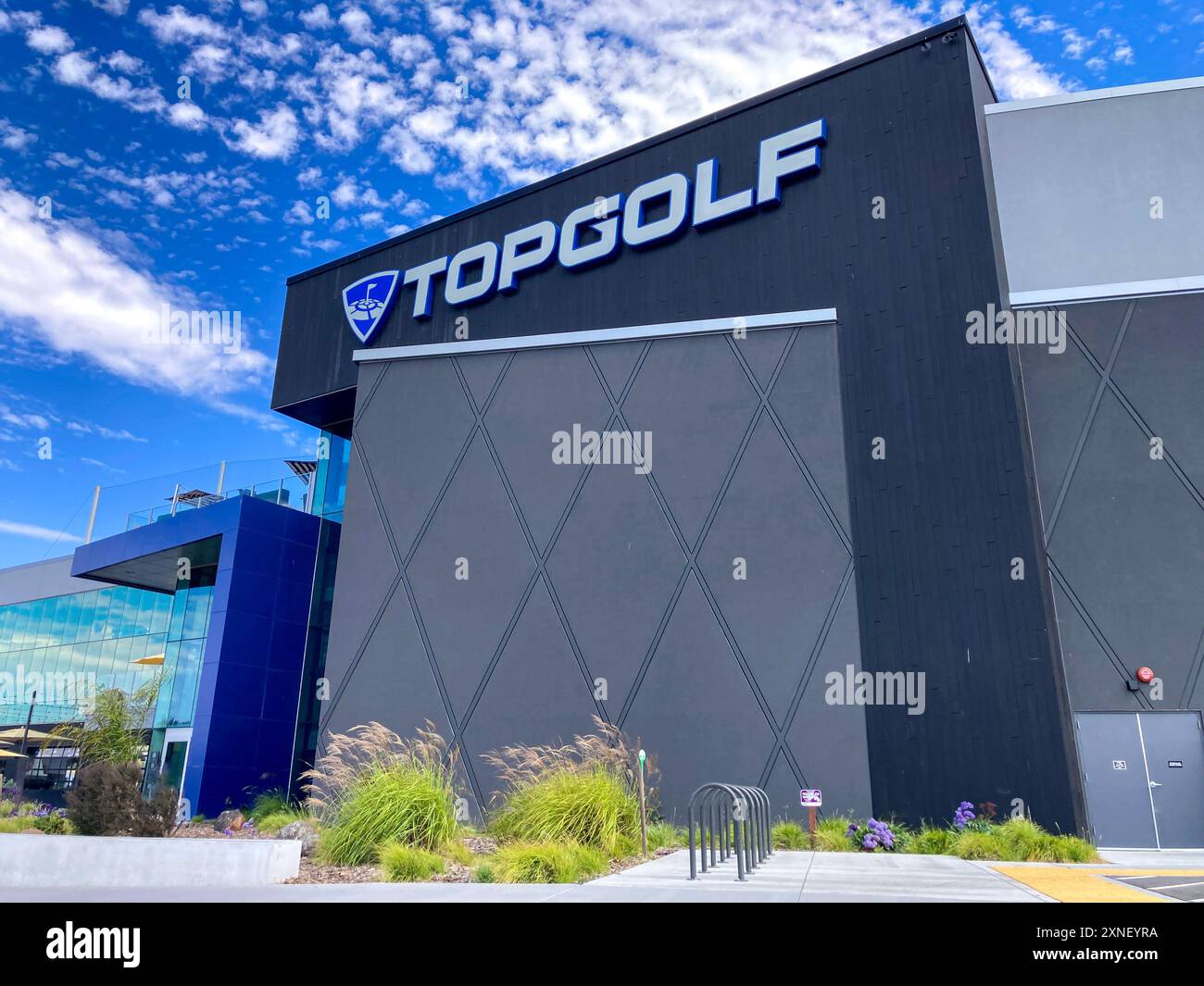 Topgolf sign, logo on the building facade of sport entertainment venue ...