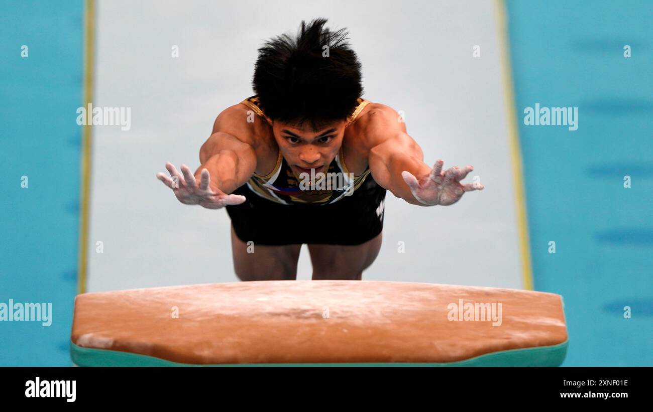 Carlos Edriel Yulo, of the Philippines, performs on the vault during ...