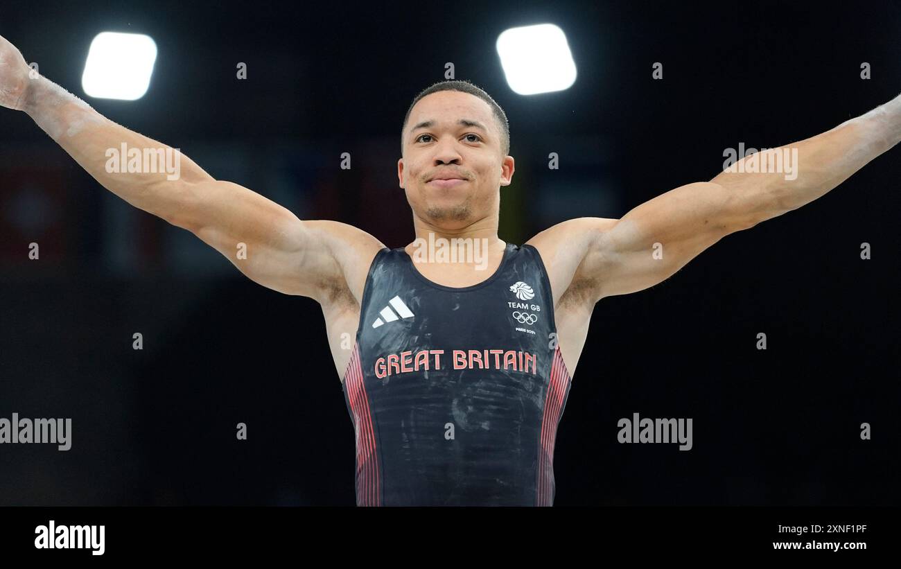 Joe Fraser, of Britain, performs on the vault during the men's artistic ...