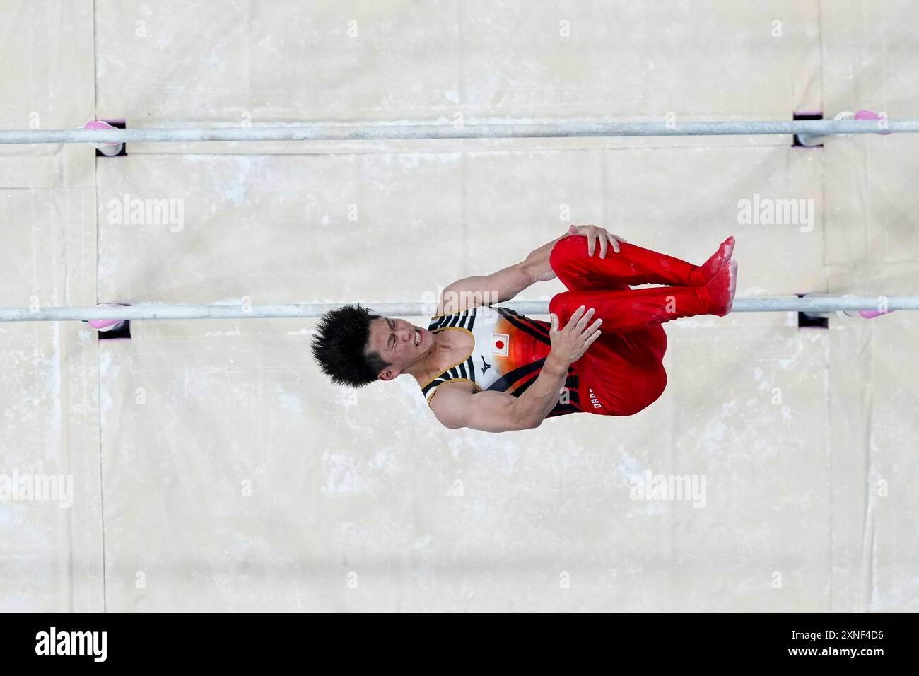 Daiki Hashimoto, of Japan, performs on the parallel bars during the men ...