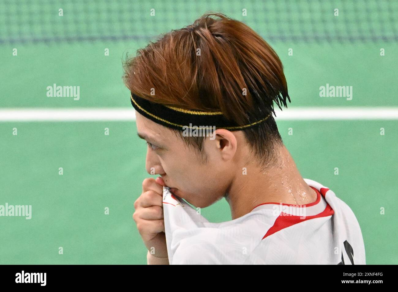 NARAOKA Kodai (JPN) kiss the Japanese flag emblem on the uniform ...