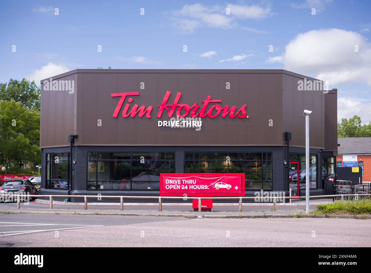 WATFORD, UK - July 10, 2024. Exterior of Tim Hortons Drive Thru ...