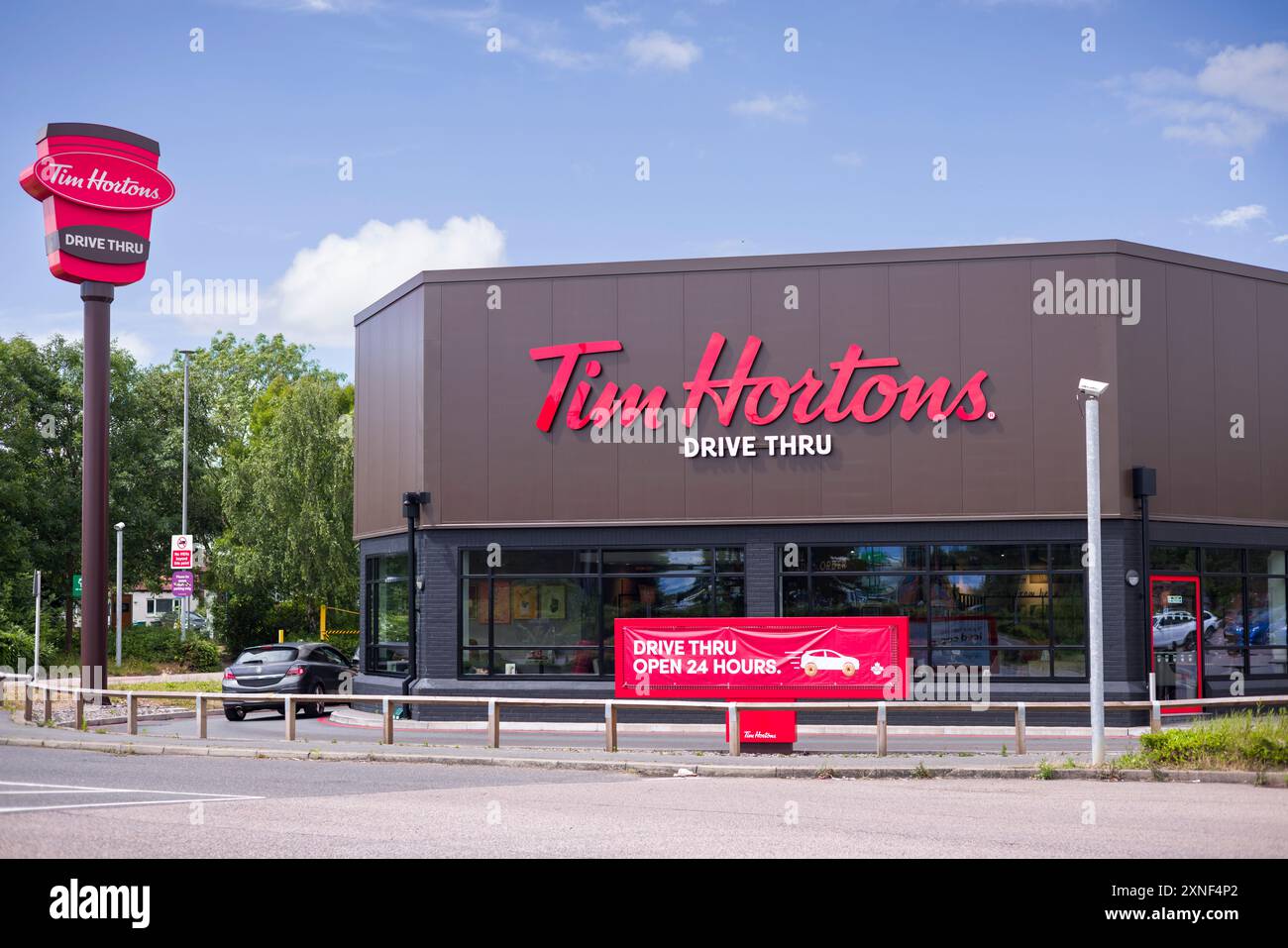 WATFORD, UK - July 10, 2024. Exterior of Tim Hortons Drive Thru ...