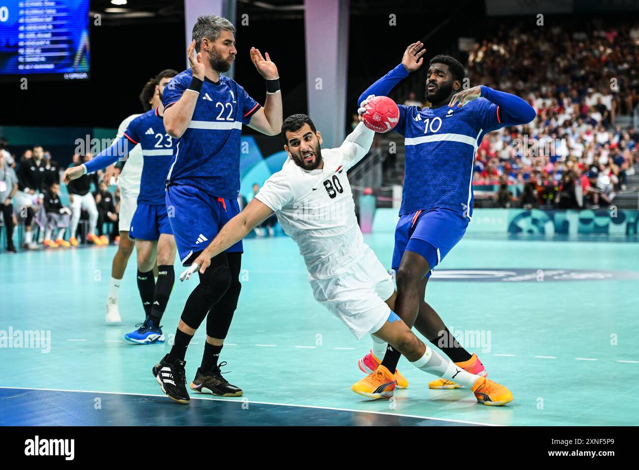 KARABATIC Luka of France, ADEL Ahmed of Egypt and MEM Dika of France during the handball match ...